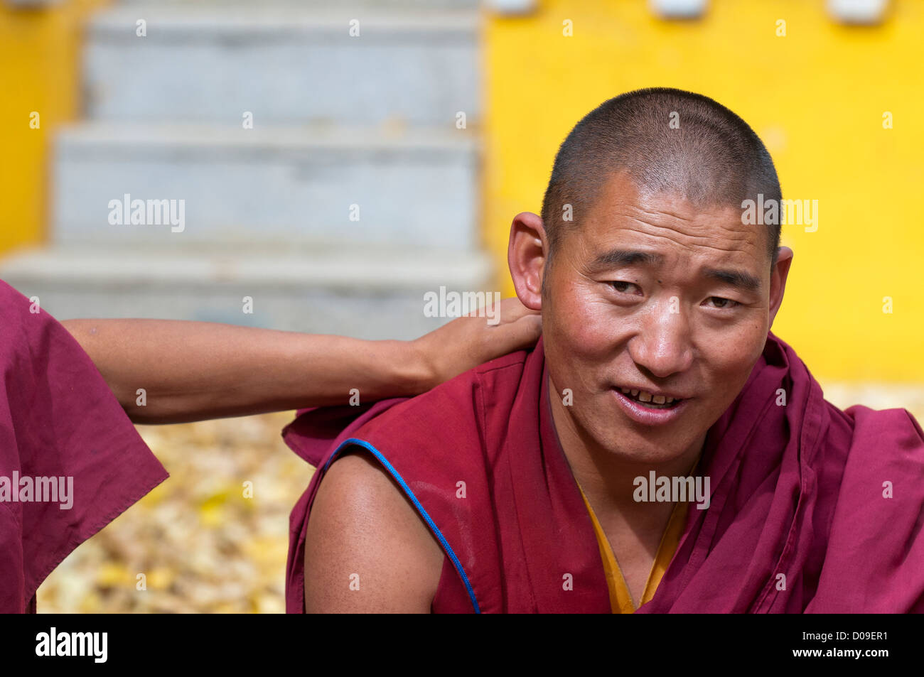 Buddhist monk listens to spirited debate, Drigung Thel Monastery, Tibet ...