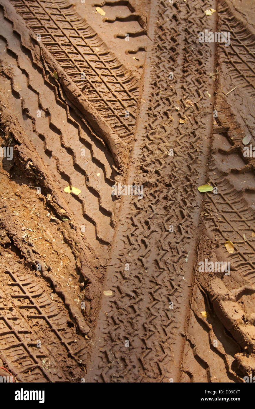 Tractor trail closeup on the soil Stock Photo - Alamy