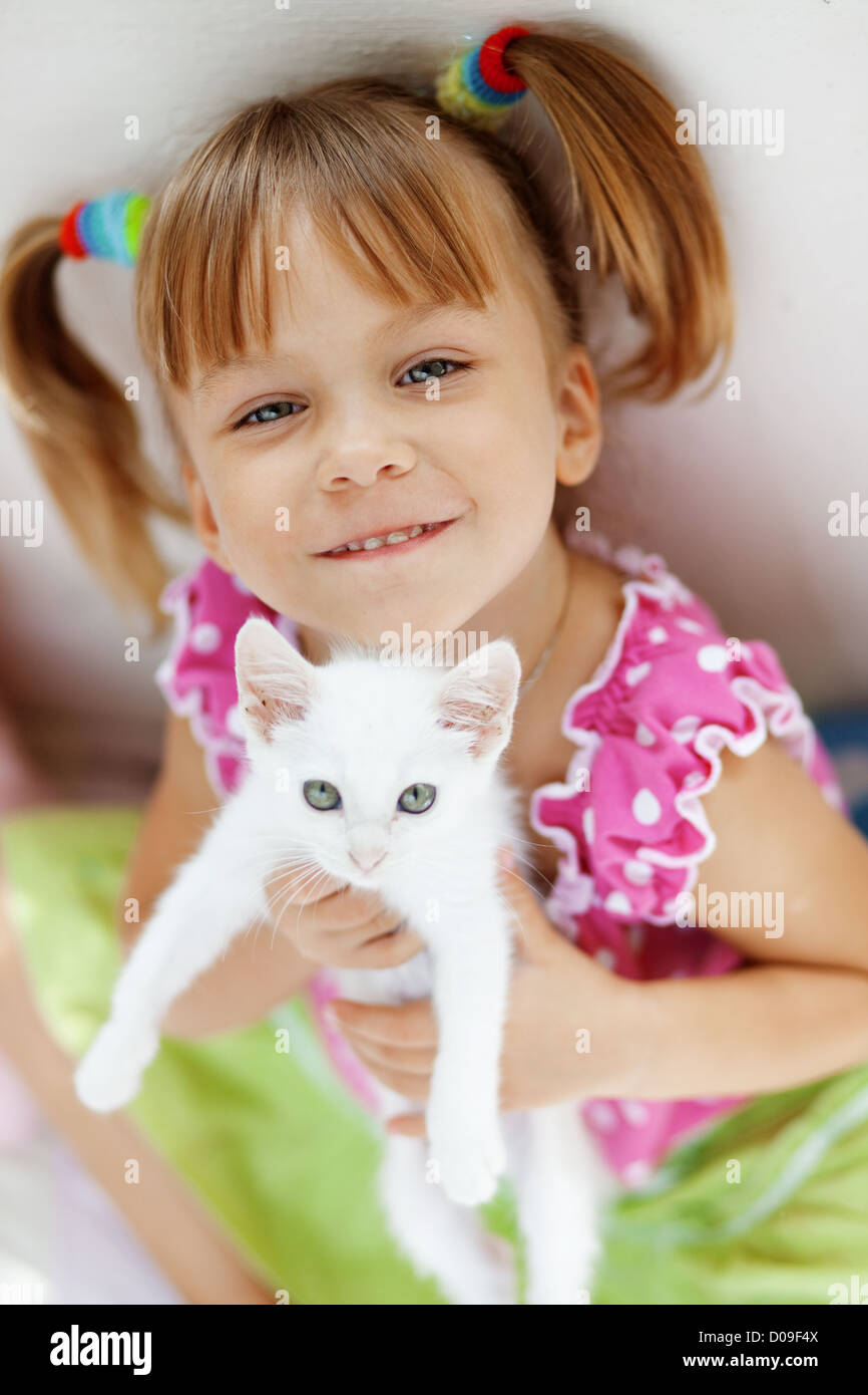 Child with kitty Stock Photo - Alamy
