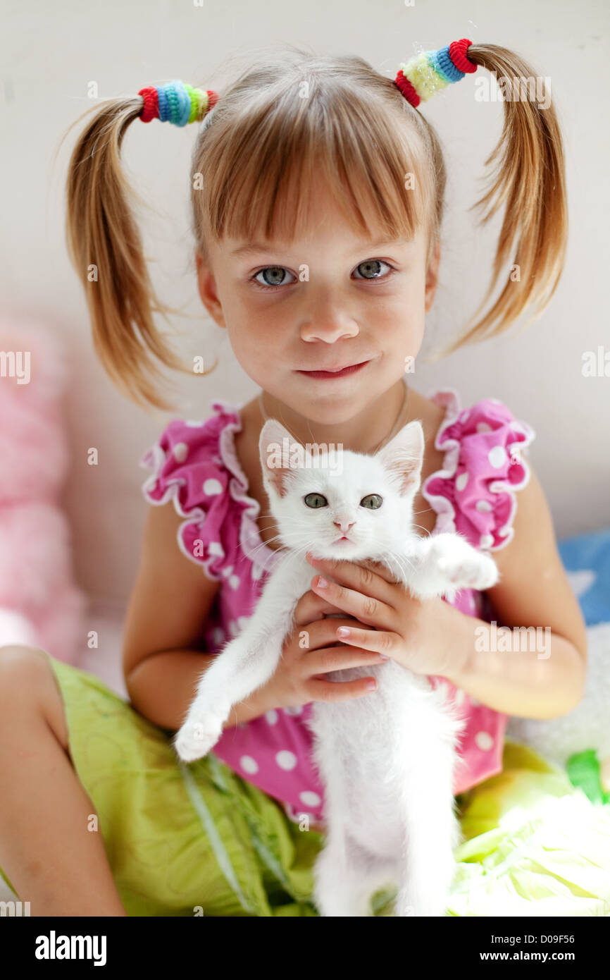 Child with kitty Stock Photo - Alamy