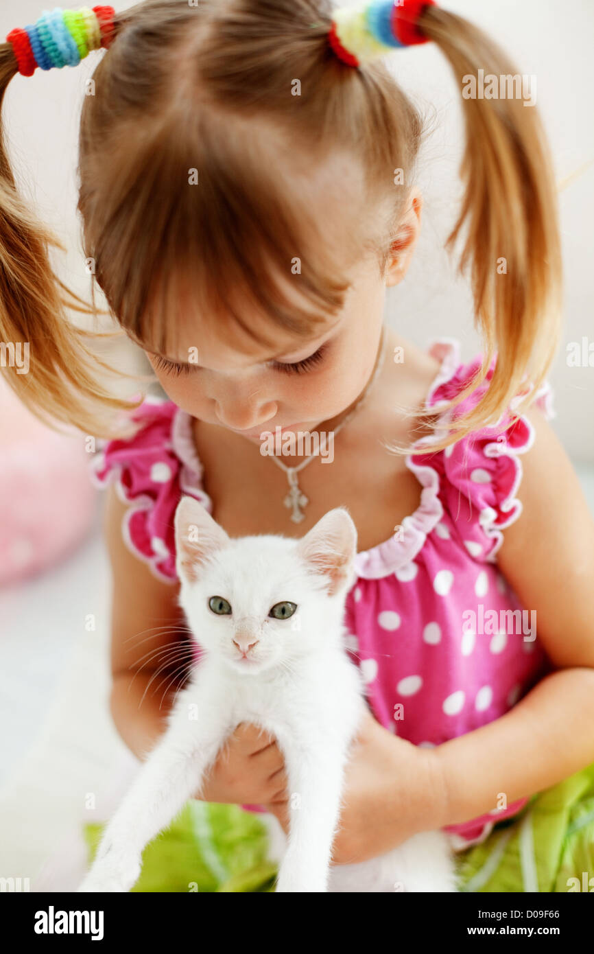 Child with kitty Stock Photo - Alamy