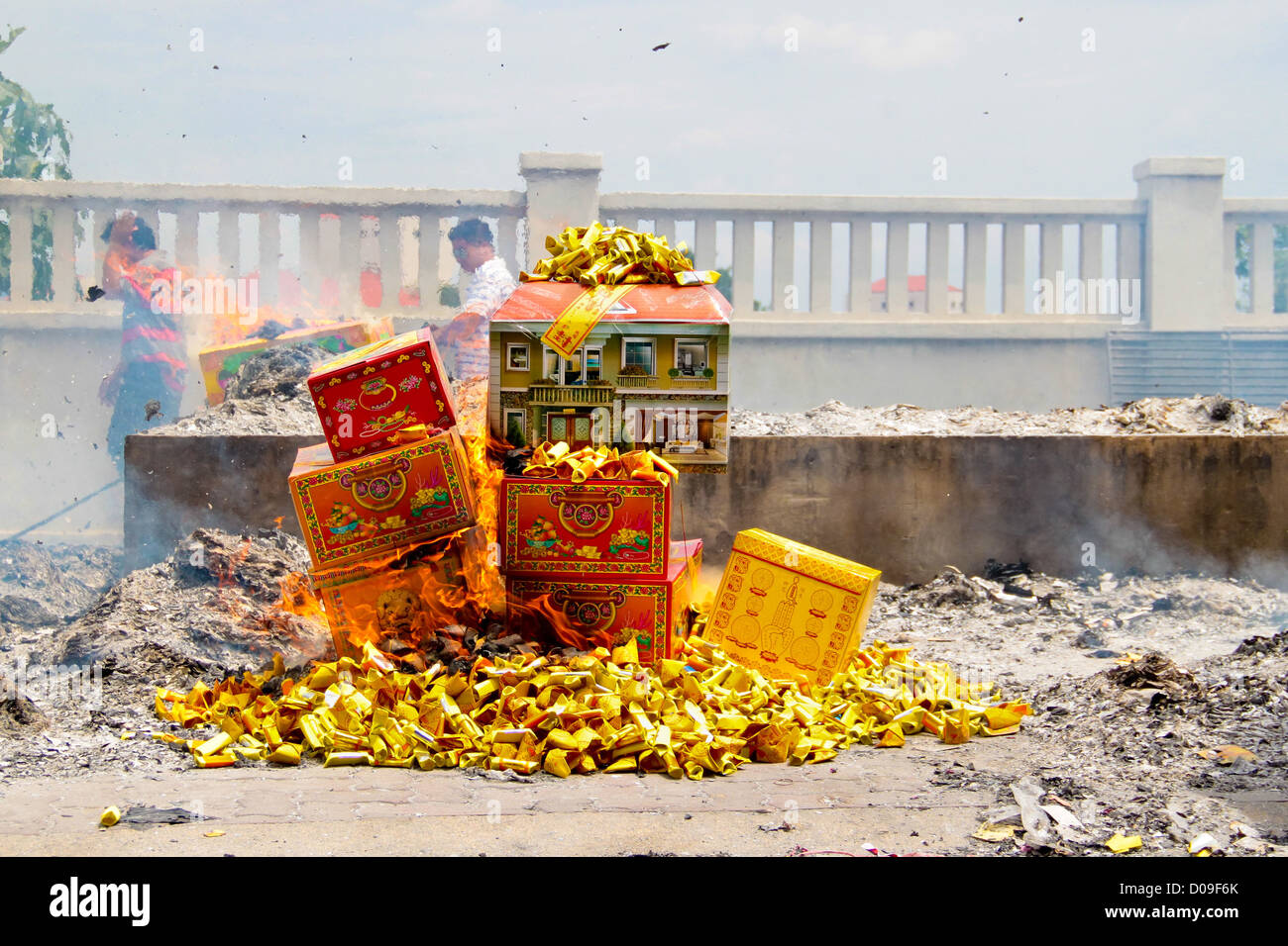 Stack of paper box full of ancestor offering on fire. Concept of ...