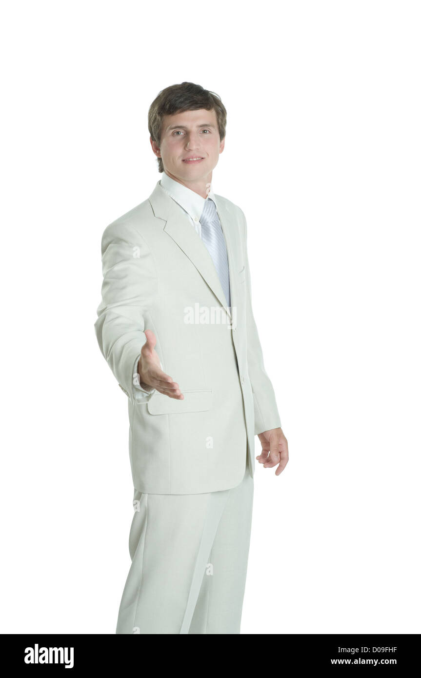 Young business person with friendly gesture Stock Photo - Alamy