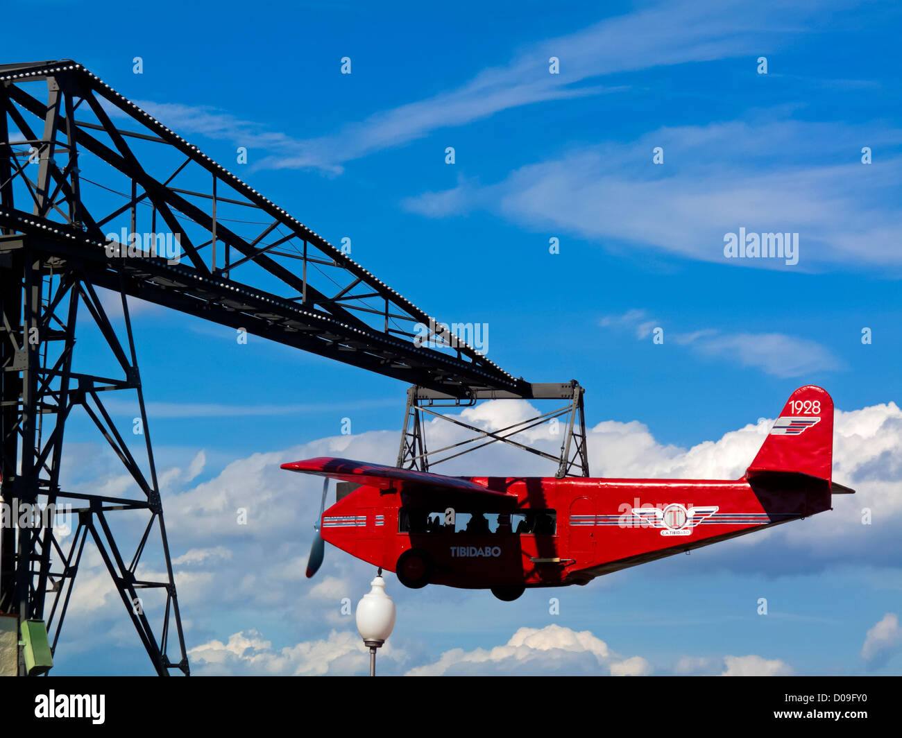 Red aeroplane ride built in 1928 at Tibidabo amusement park on a ...