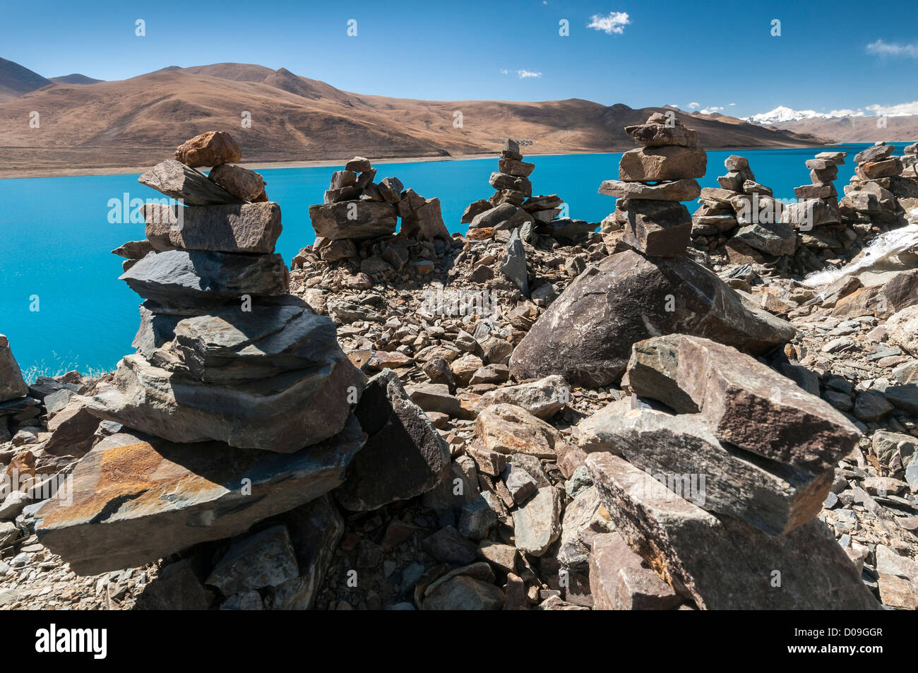 Stones stacked into minerature pagodas or chorten by Buddhist pilgrims ...