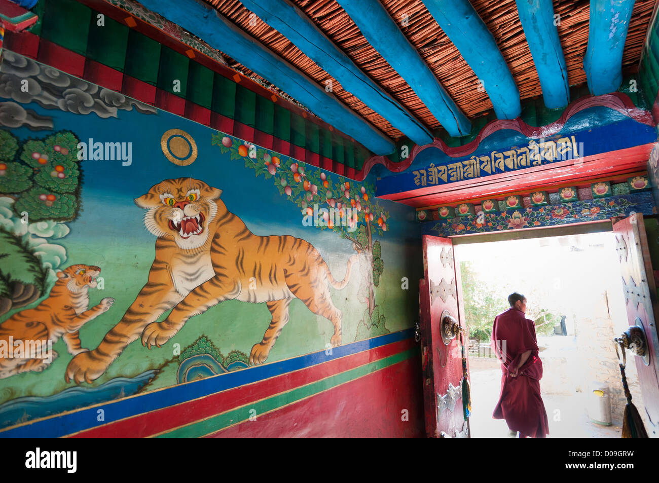 Buddhist monk opening temple door hi-res stock photography and images ...