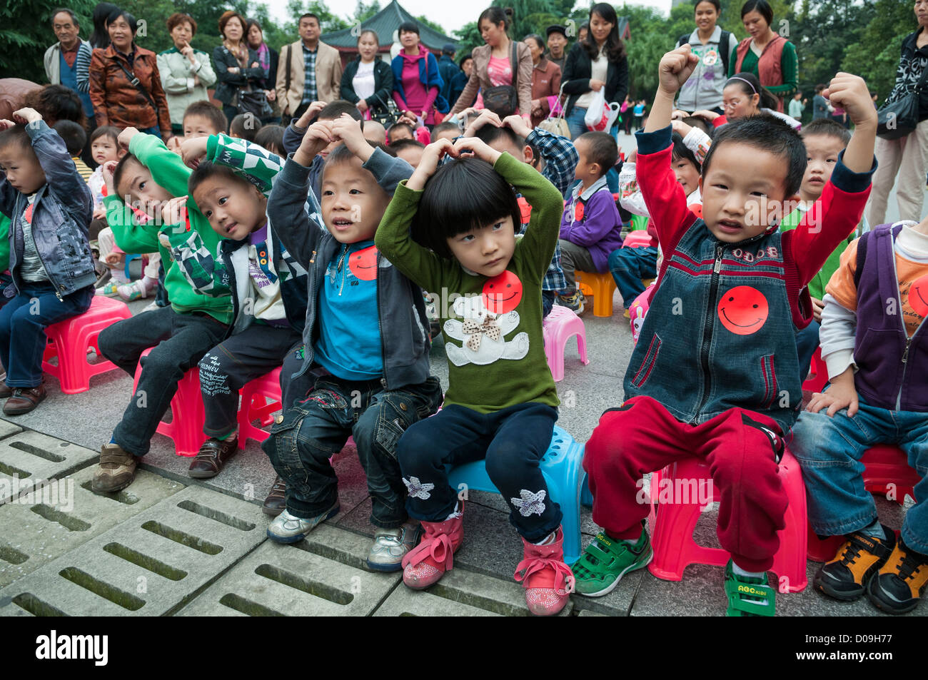 School children act out characters during story time in Wenhua Park ...