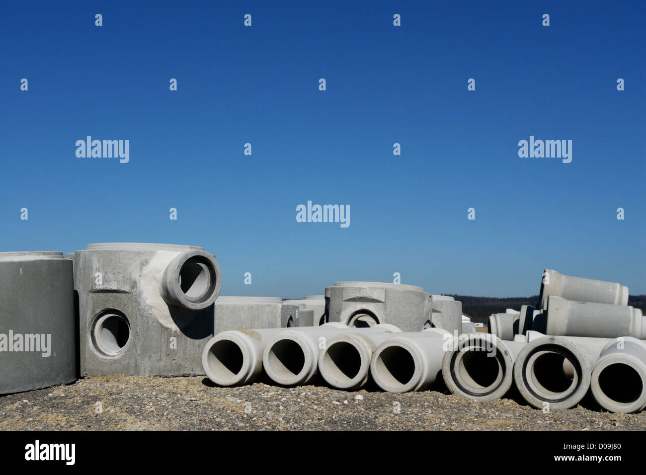 concrete pipes on a building site on a sunny day Stock Photo - Alamy