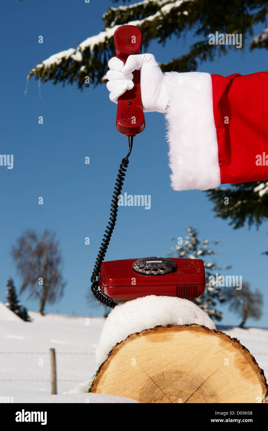 Santa Claus Hotline symbolized by a red retro phone Stock Photo - Alamy