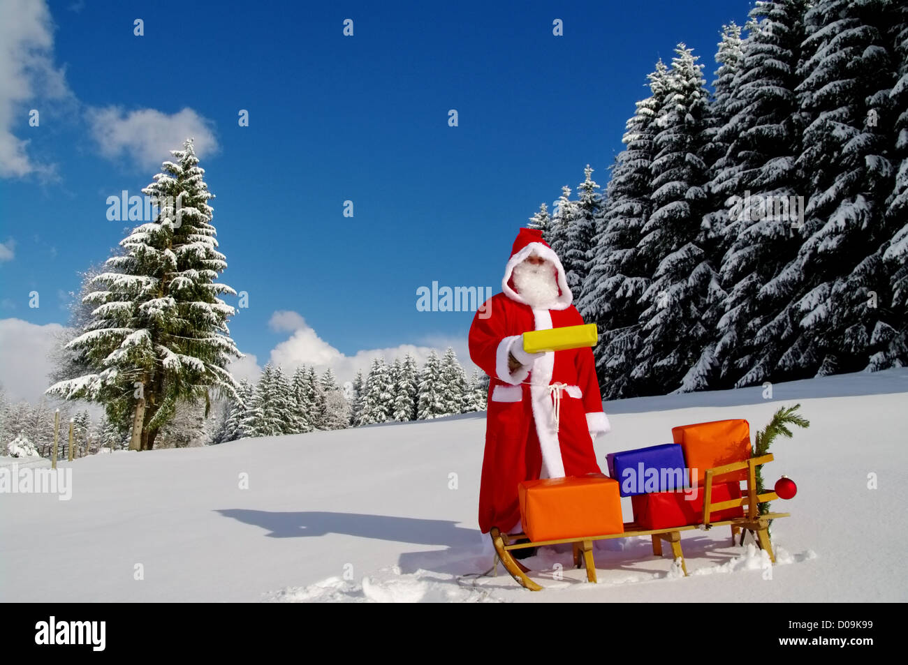 Father christmas with parcel hi-res stock photography and images - Alamy