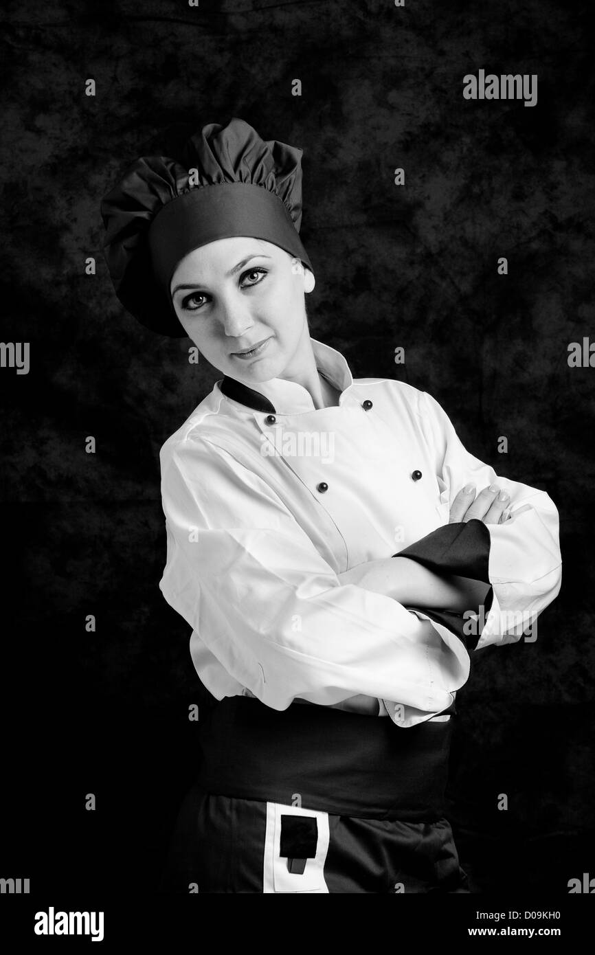 portrait photo of young female chef in front of rural background Stock ...
