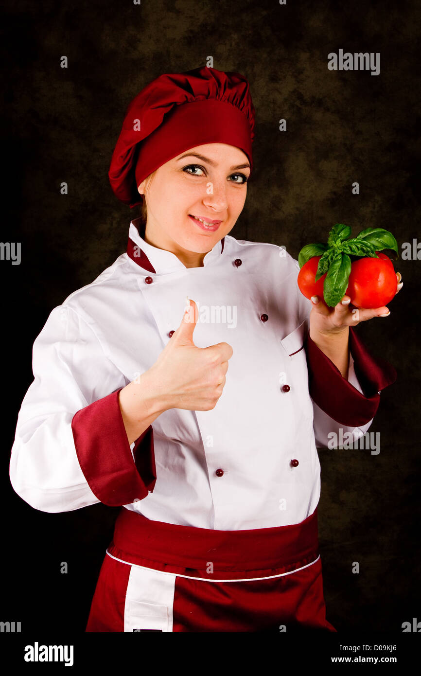 portrait photo of young female chef in front of rural background Stock ...