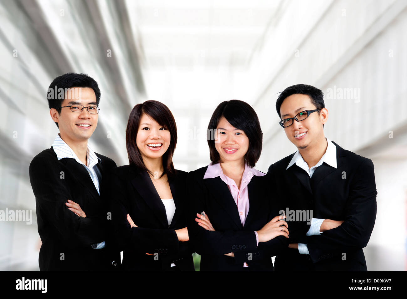 Asian business team on office background Stock Photo - Alamy
