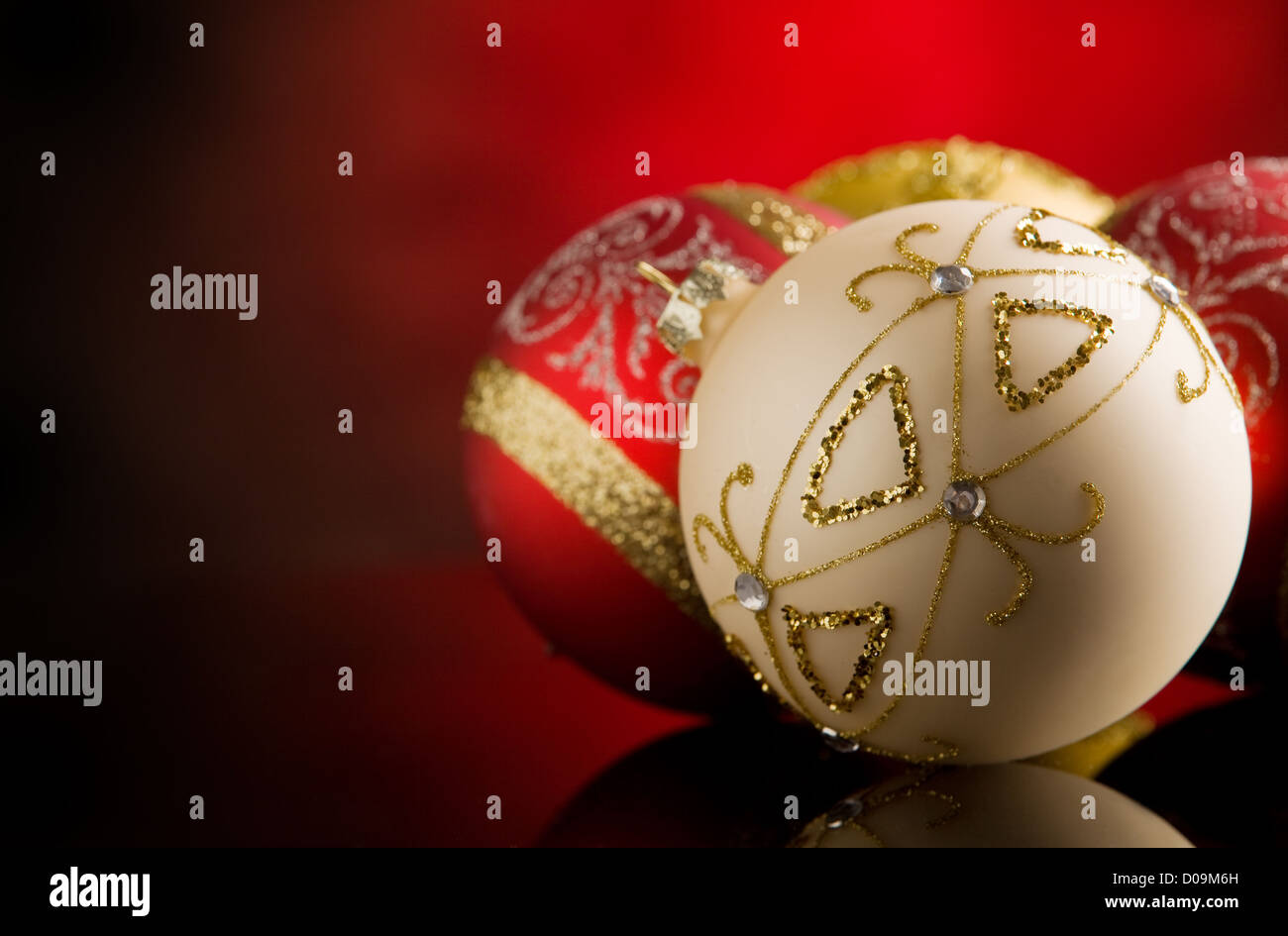 photo of shiny round christmas balls in front of rural background Stock ...