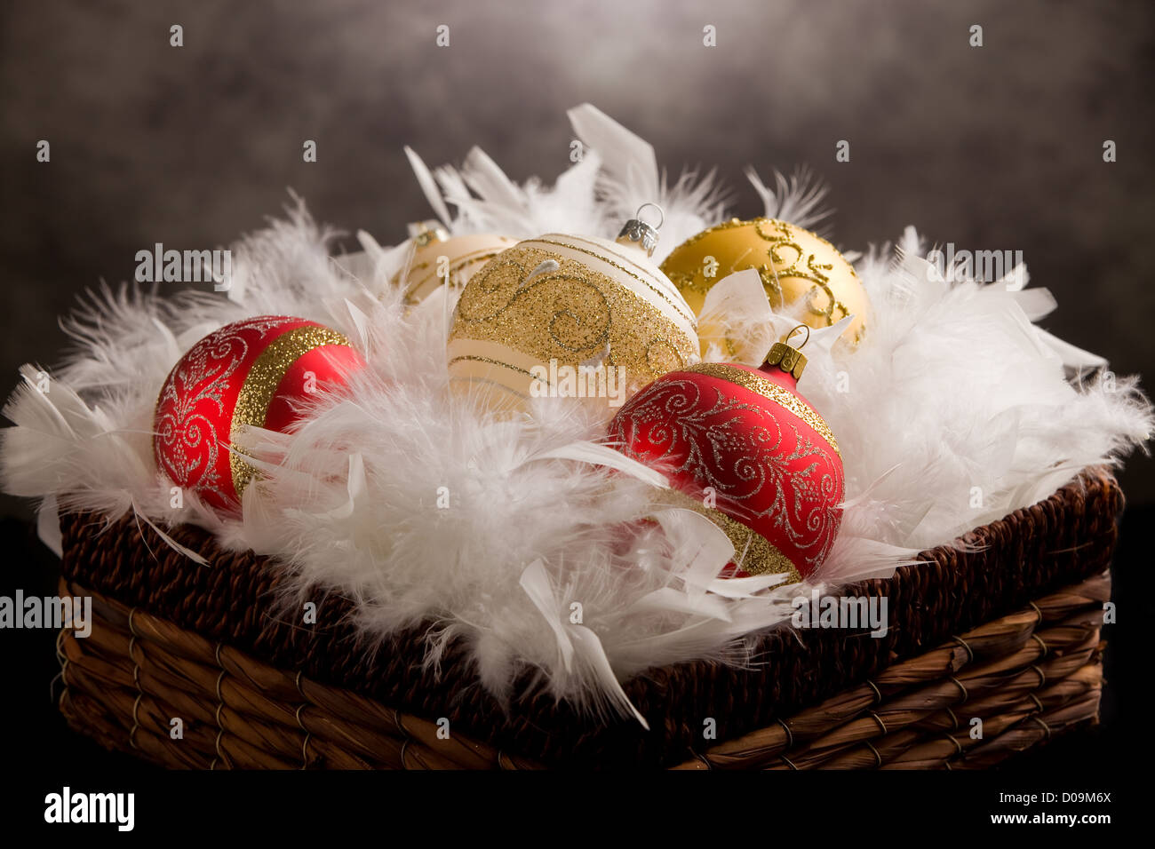 photo of christmas balls inside a feather basket in front of a rural ...