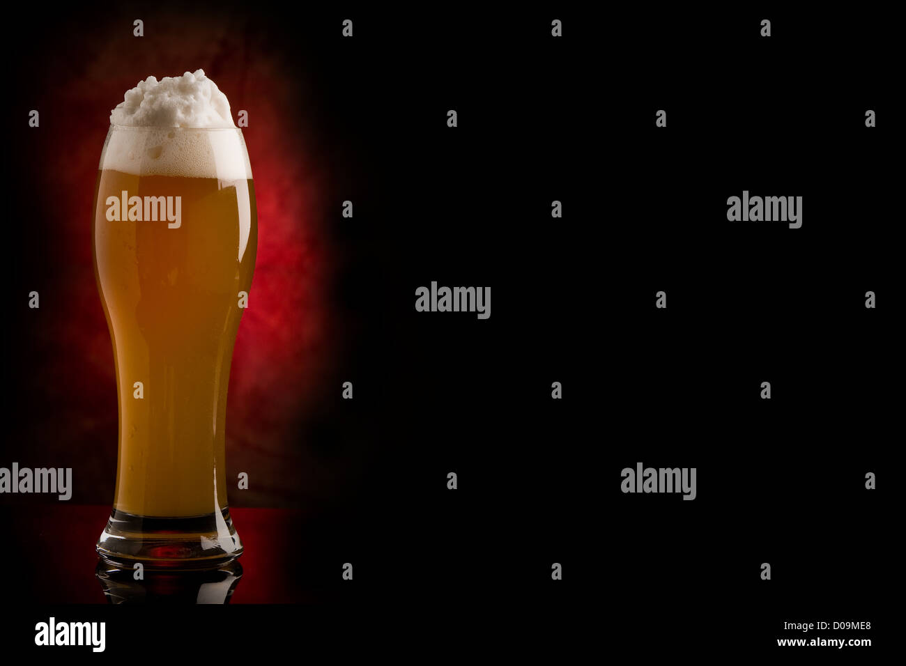 photo of cold delicious beer in front of a rural background Stock Photo ...