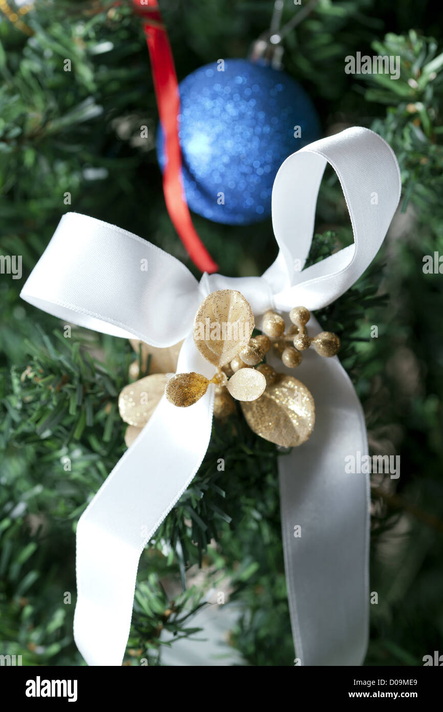 a close up christmas bow on a tree Stock Photo - Alamy