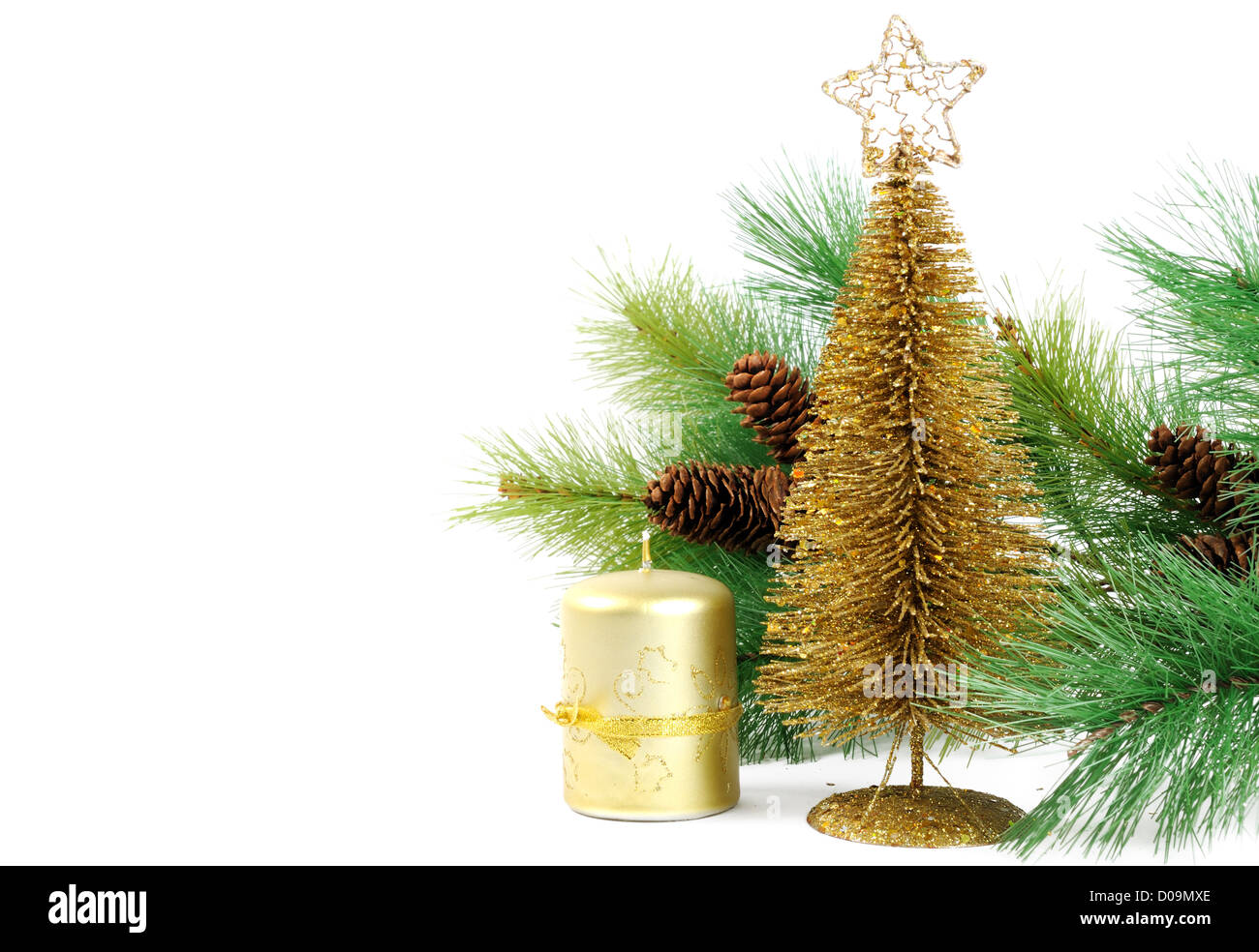 Golden Christmas tree with candle, isolated on white Stock Photo - Alamy