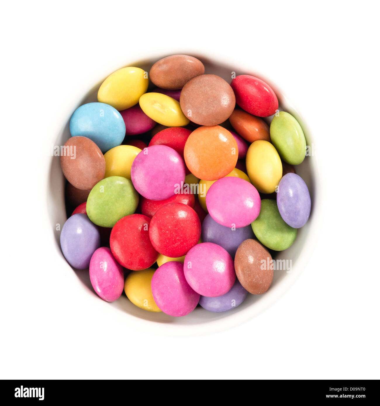 Colorful chocolate in front of white background Stock Photo - Alamy