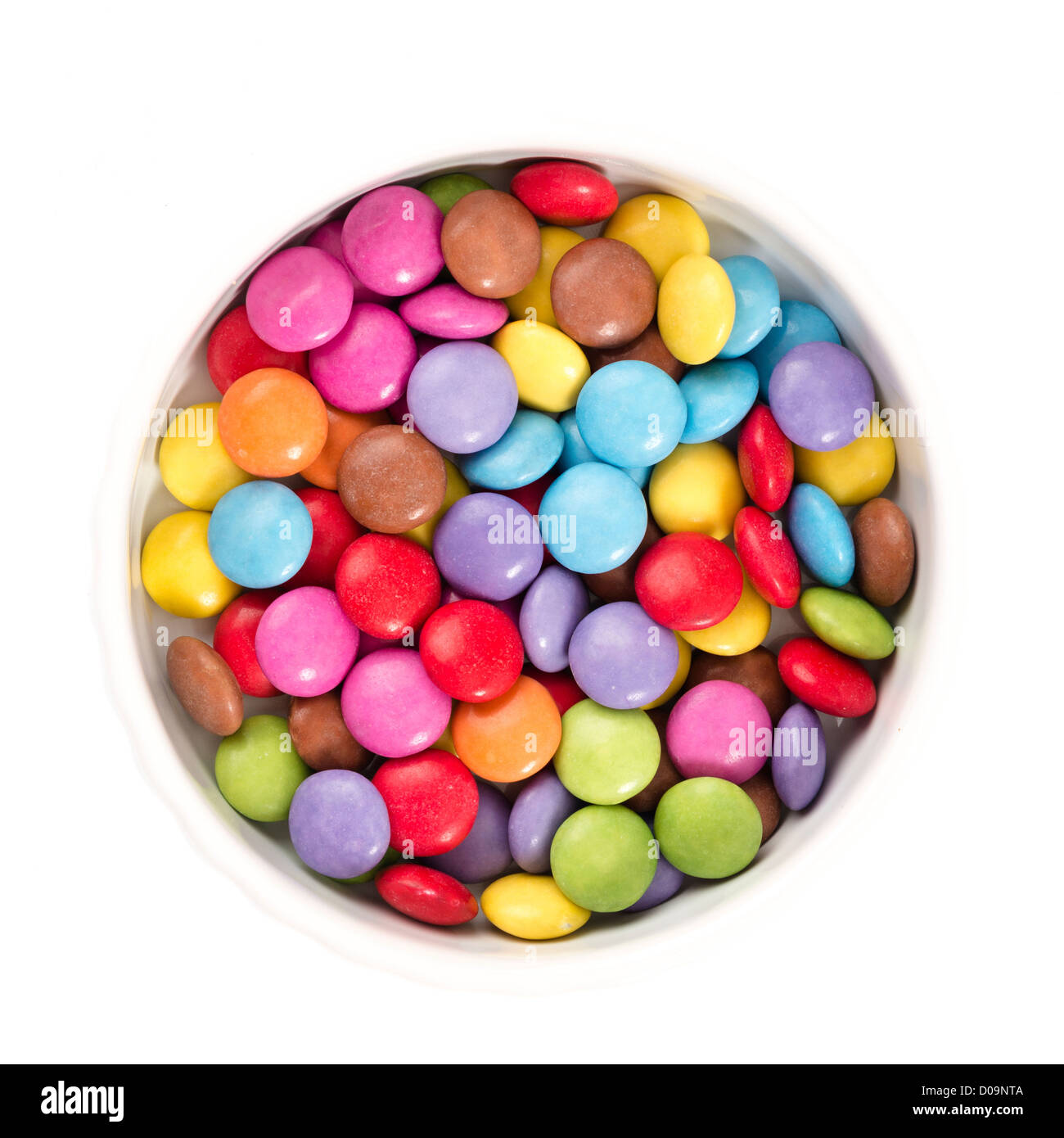 Colorful chocolate in front of white background Stock Photo - Alamy