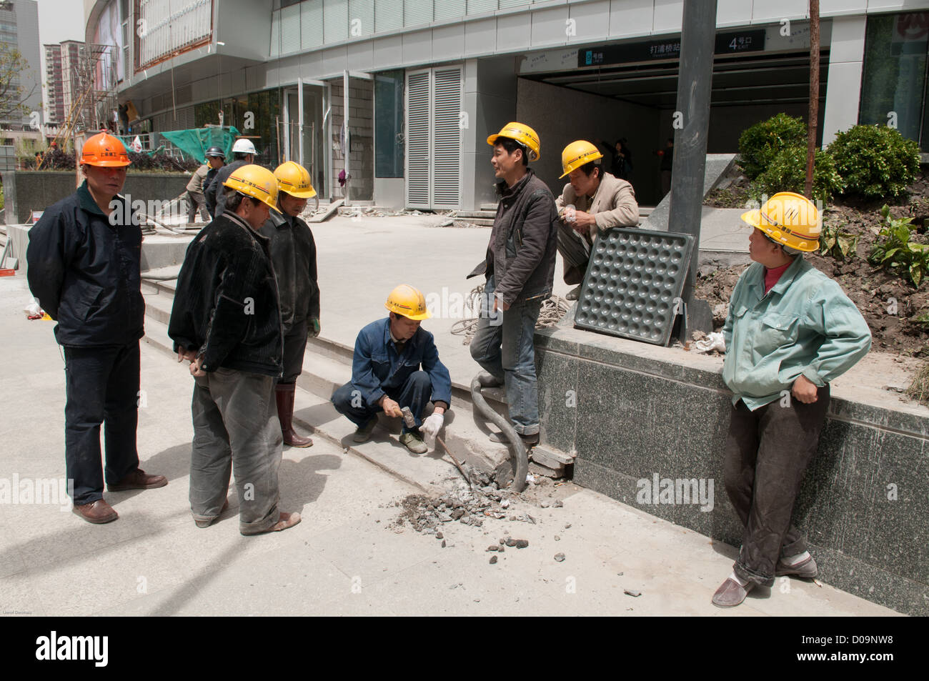 Asia city migrant workers hi-res stock photography and images - Alamy