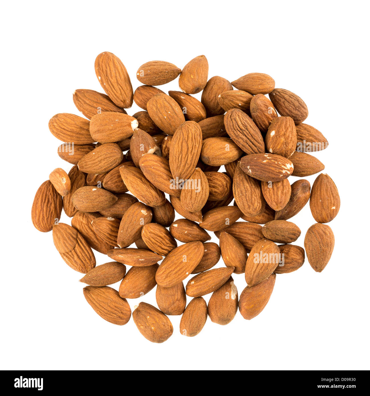Almonds in front of white background Stock Photo - Alamy