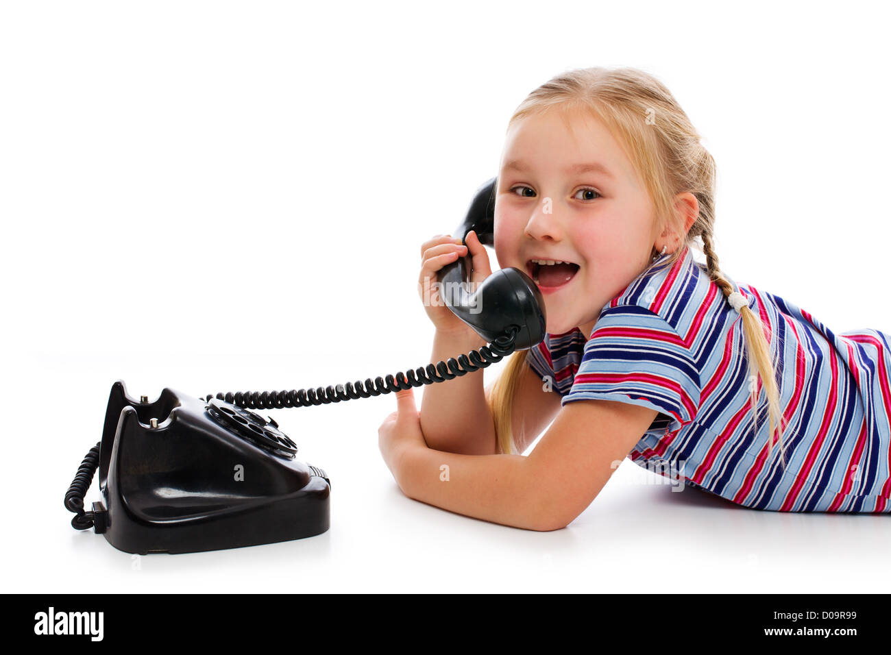 Little girl with old retro phone. Studio shot on white background Stock ...
