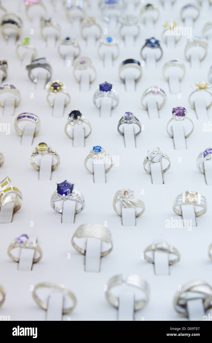 many jewellery rings in an outlet Stock Photo - Alamy