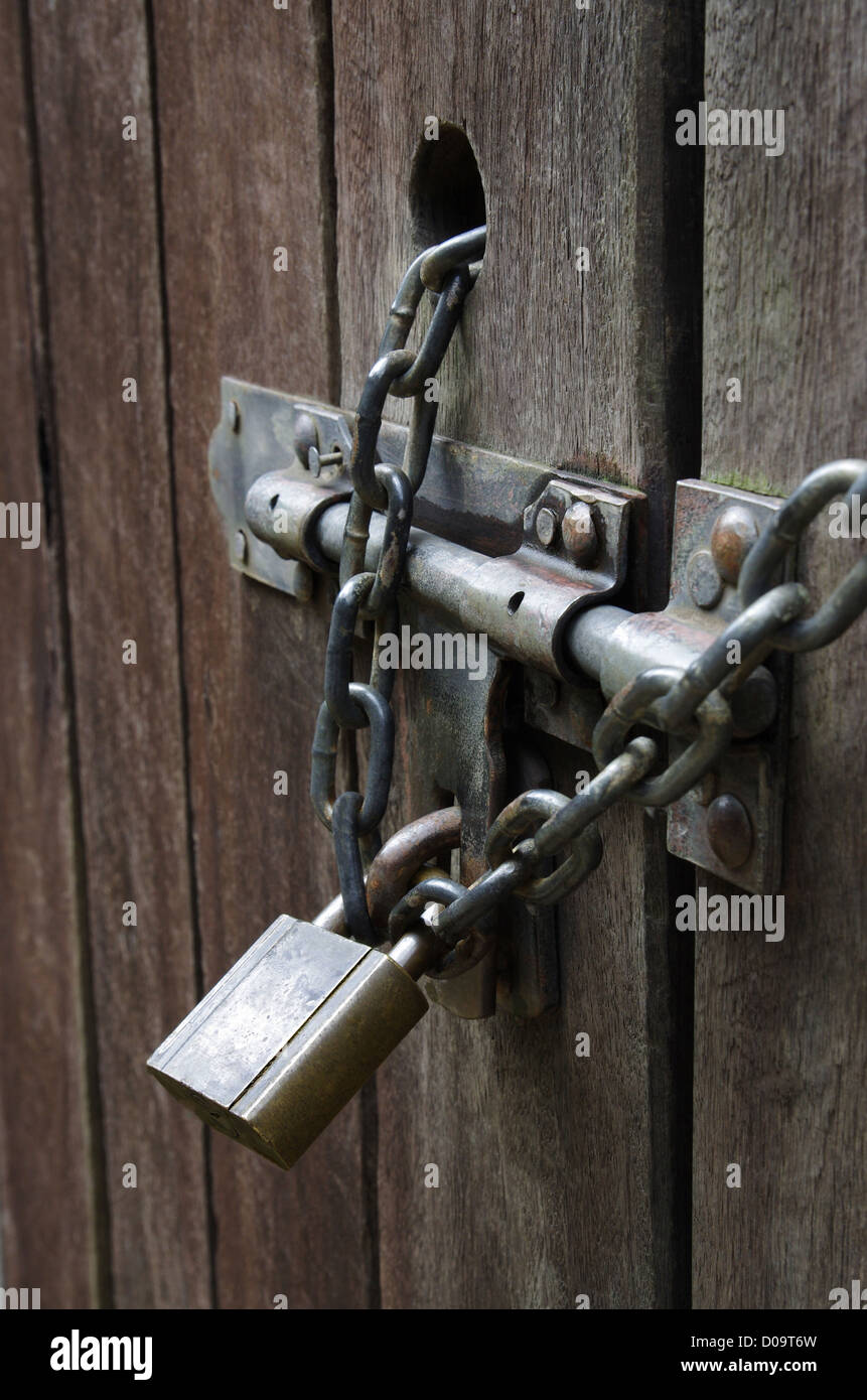 chain with a security bolt and padlock Stock Photo - Alamy