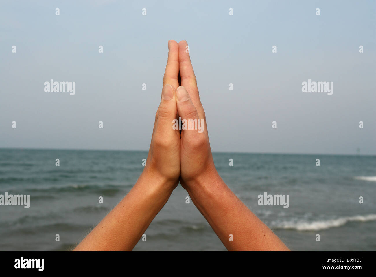 hands on the beach on a nice day Stock Photo - Alamy