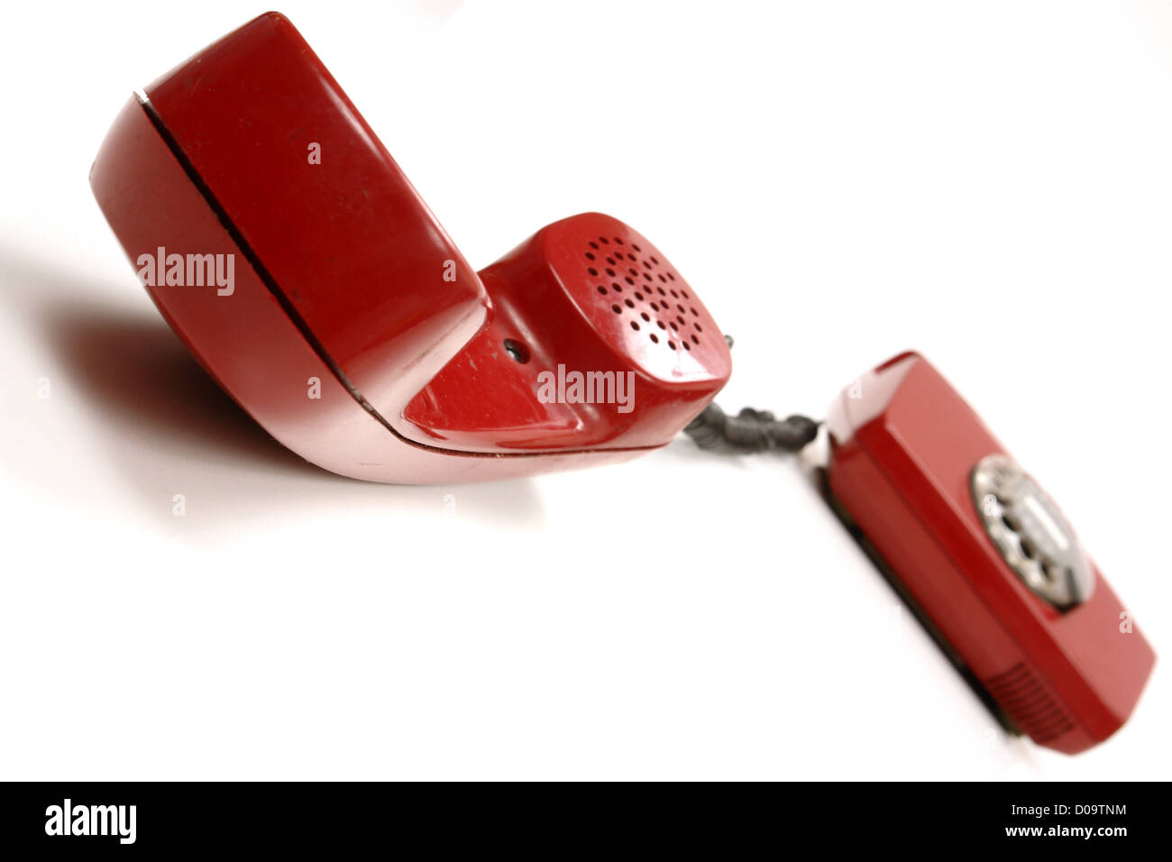 a red retro phone on white Stock Photo - Alamy