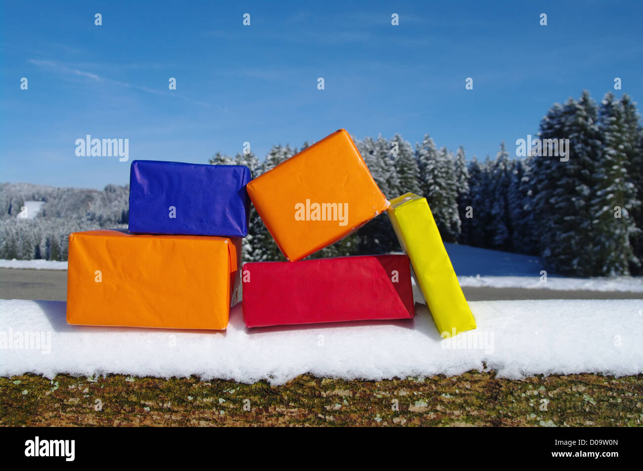 present parcels outside in a snowy landscape Stock Photo - Alamy
