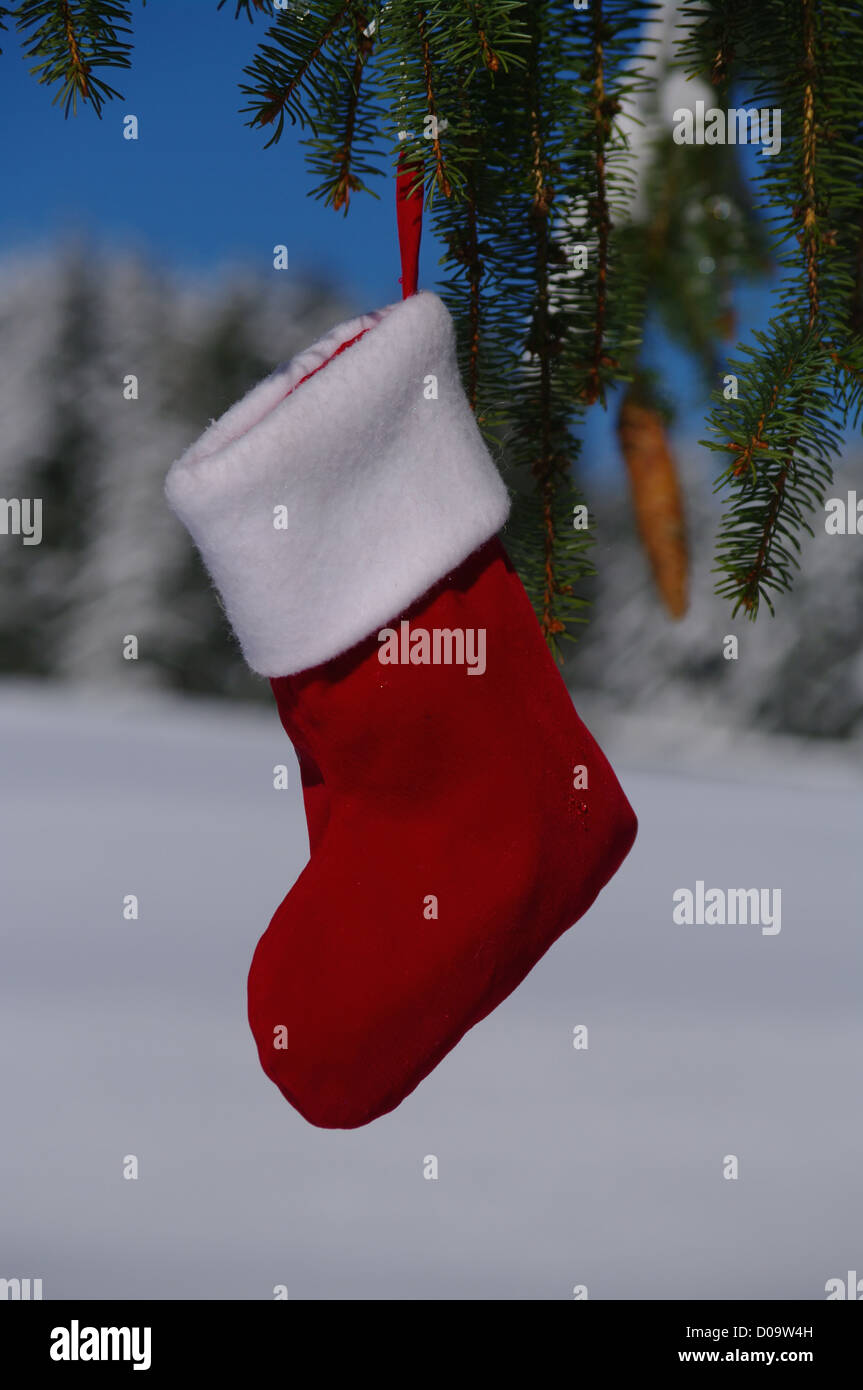 Santa Claus Christmas boot for gifts outside in a snowy landscape Stock ...