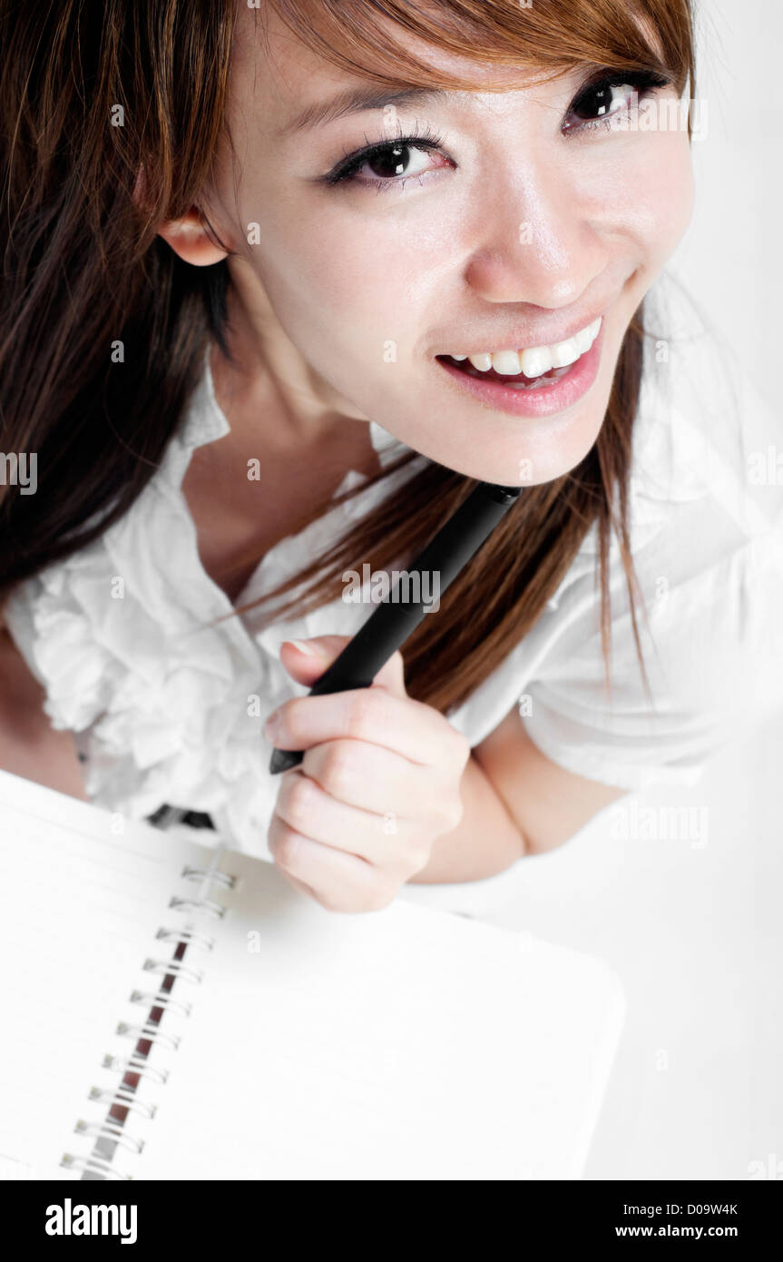 College student studying, blank book ready for text Stock Photo - Alamy
