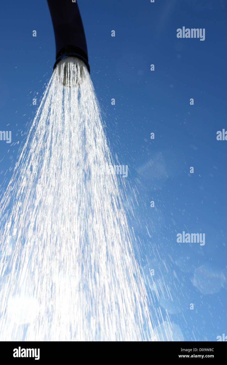 water drops falling from a shower outside Stock Photo - Alamy