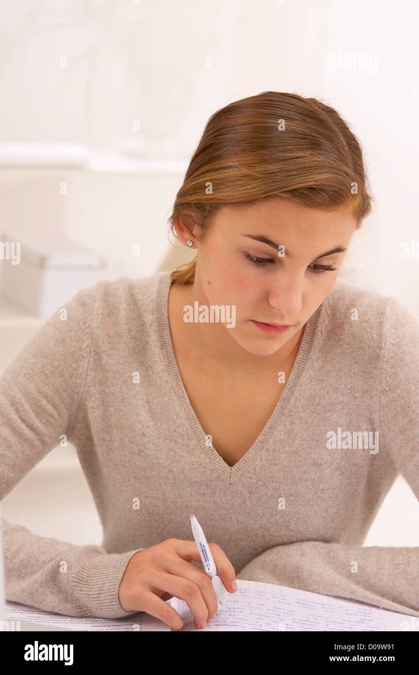 TEENAGER DOING HOMEWORK Stock Photo - Alamy