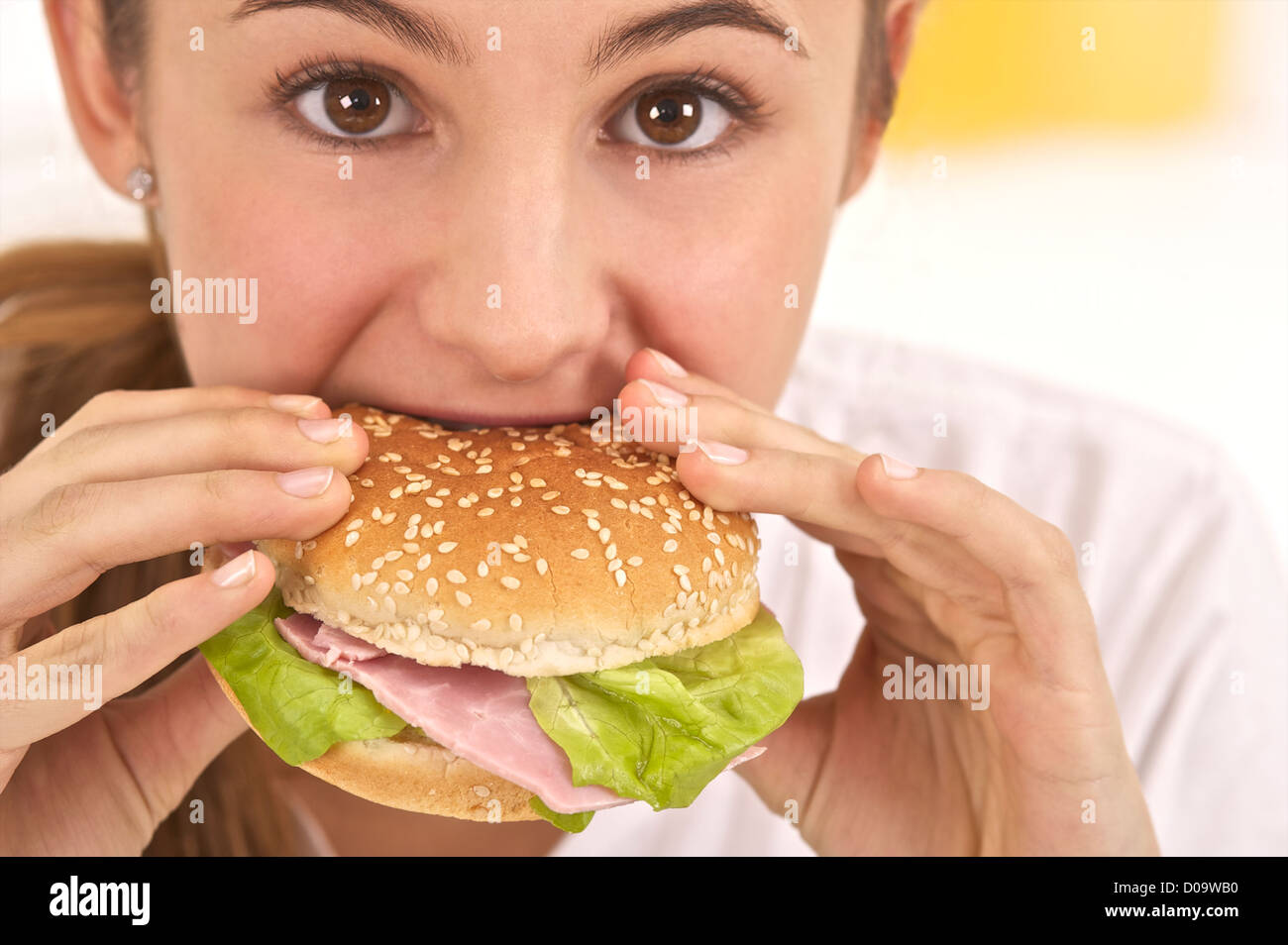 AN ADOLESCENT EATING Stock Photo - Alamy
