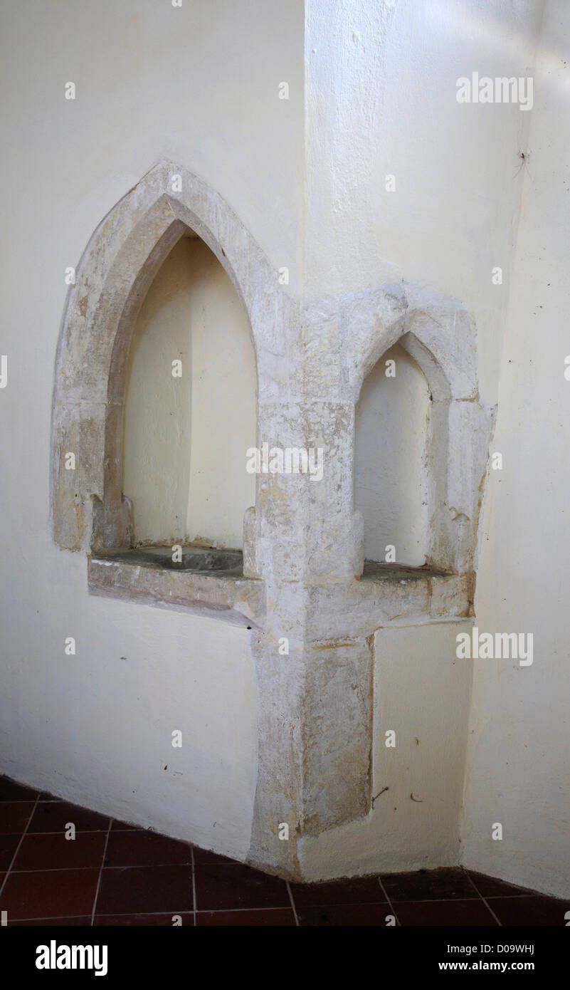 A view of a double piscina in the Parish Church of SS Peter and Paul at ...