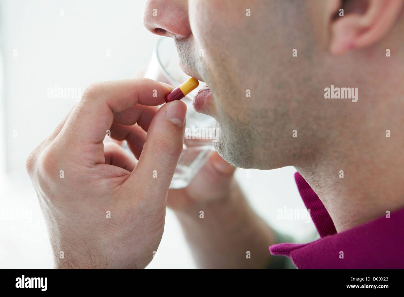 MAN TAKING MEDICATION Stock Photo - Alamy