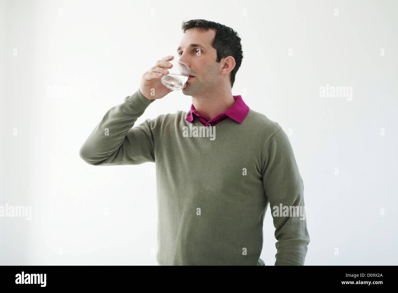 MAN WITH COLD DRINK Stock Photo - Alamy