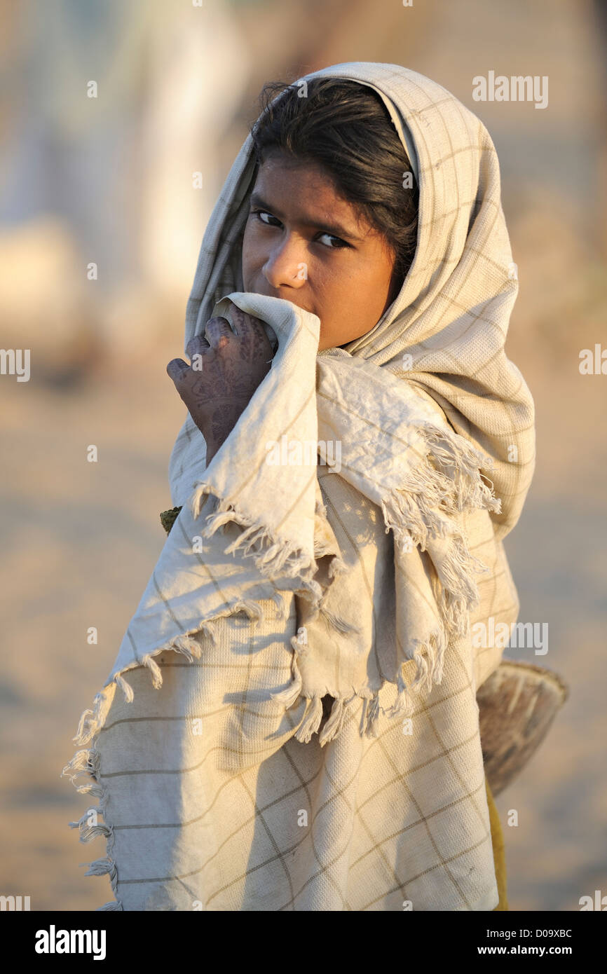Close-up of cute little girl in the desert Stock Photo - Alamy