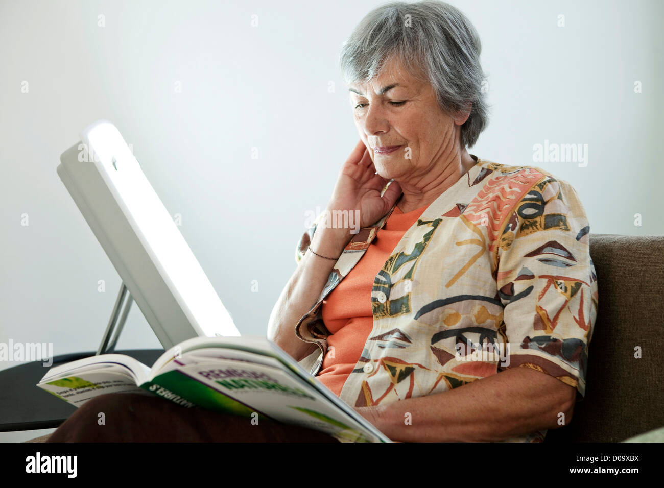 ELDERLY PERSON LIGHT THERAPY Stock Photo - Alamy
