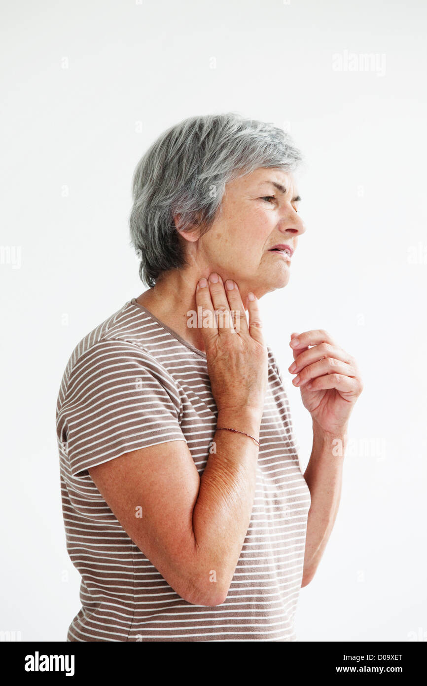 ELDERLY PERSON WITH SORE THROAT Stock Photo - Alamy