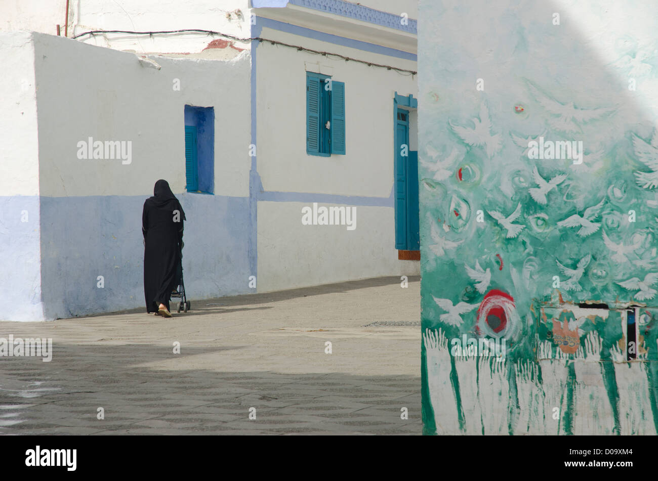 An Arab woman in Asilah's medina Morocco Stock Photo - Alamy