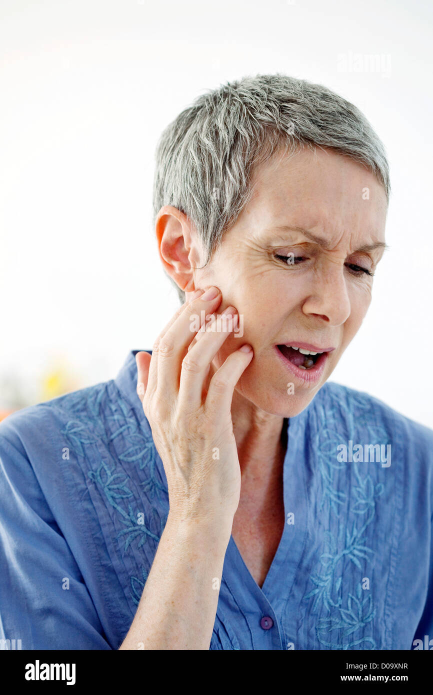 ELDERLY PERSON WITH A TOOTHACHE Stock Photo - Alamy