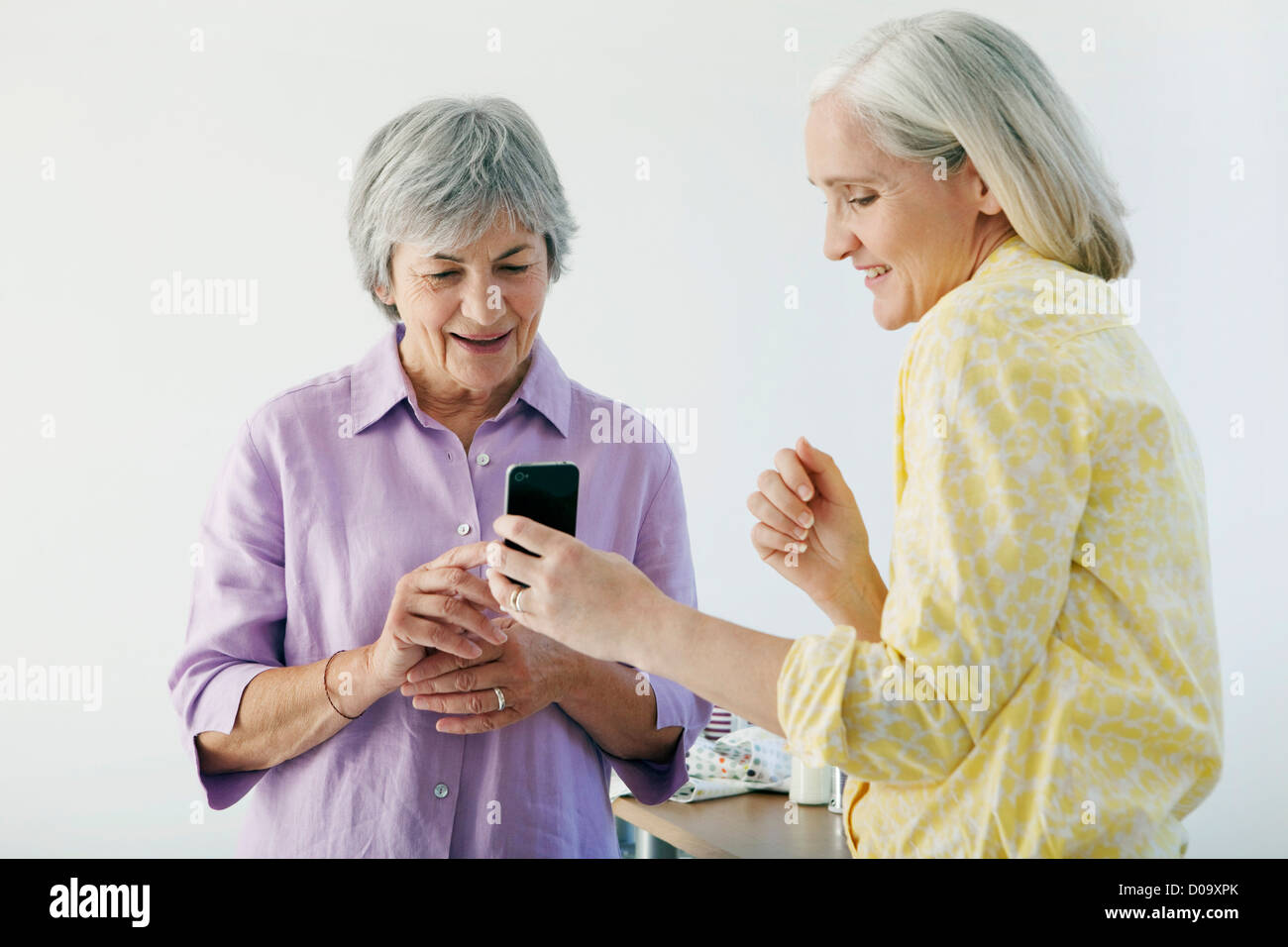 ELDERLY PERSON ON THE PHONE Stock Photo - Alamy