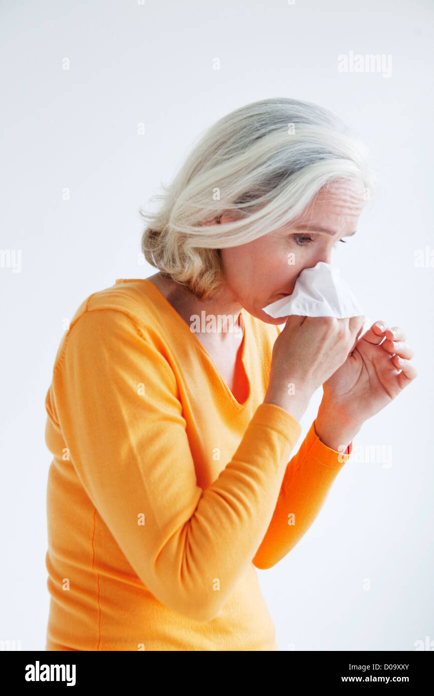 ELDERLY PERSON WITH RHINITIS Stock Photo - Alamy