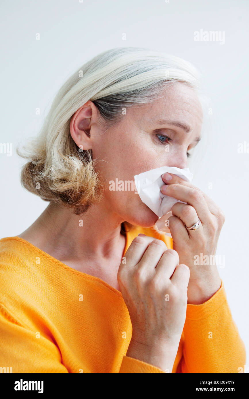 ELDERLY PERSON WITH RHINITIS Stock Photo - Alamy
