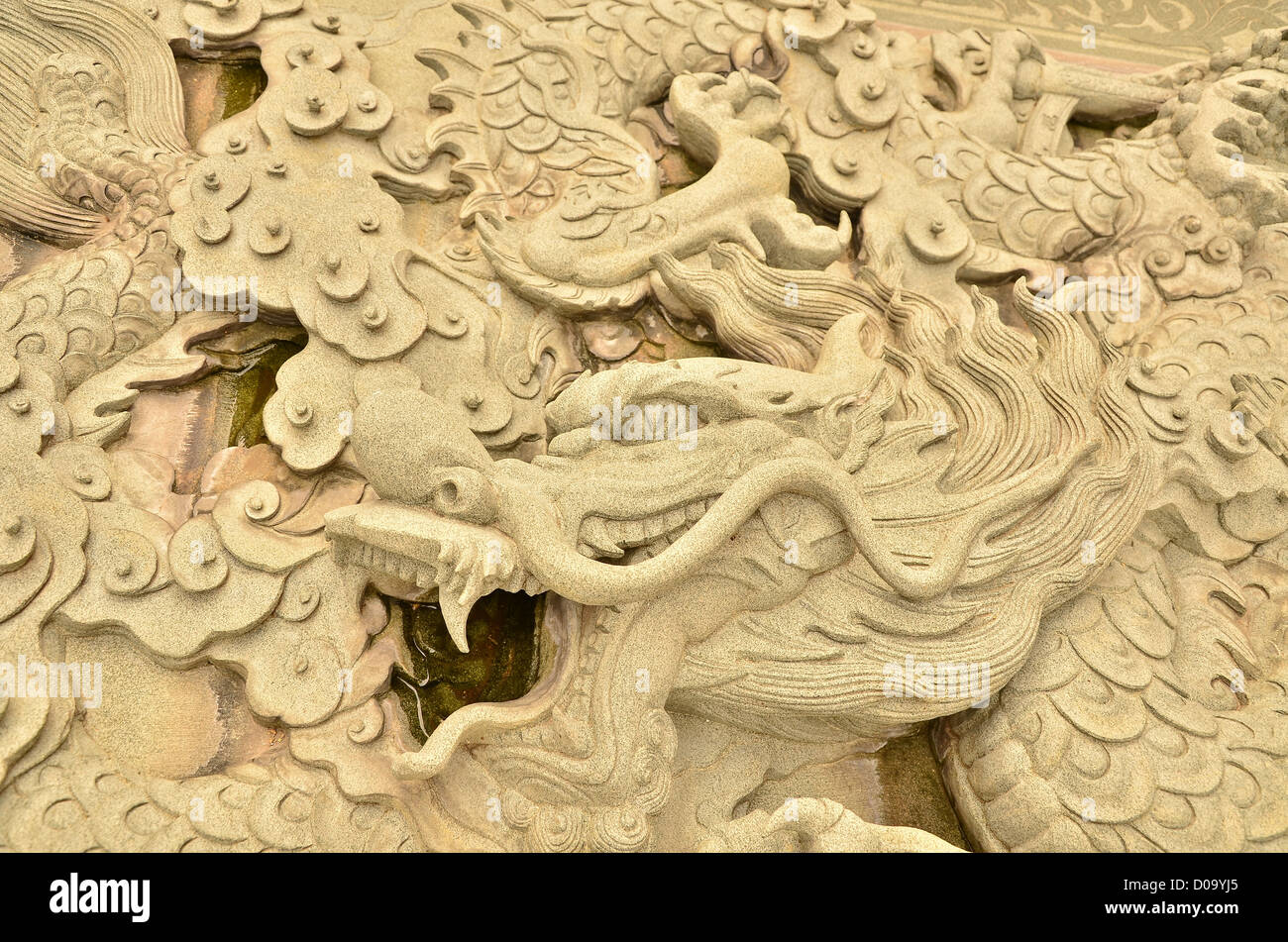 Dragon carved sandstone Stock Photo - Alamy