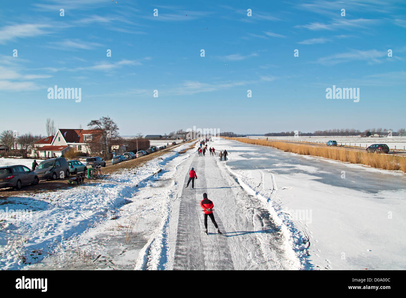 Ice skating in the countryside from the Netherlands Stock Photo - Alamy